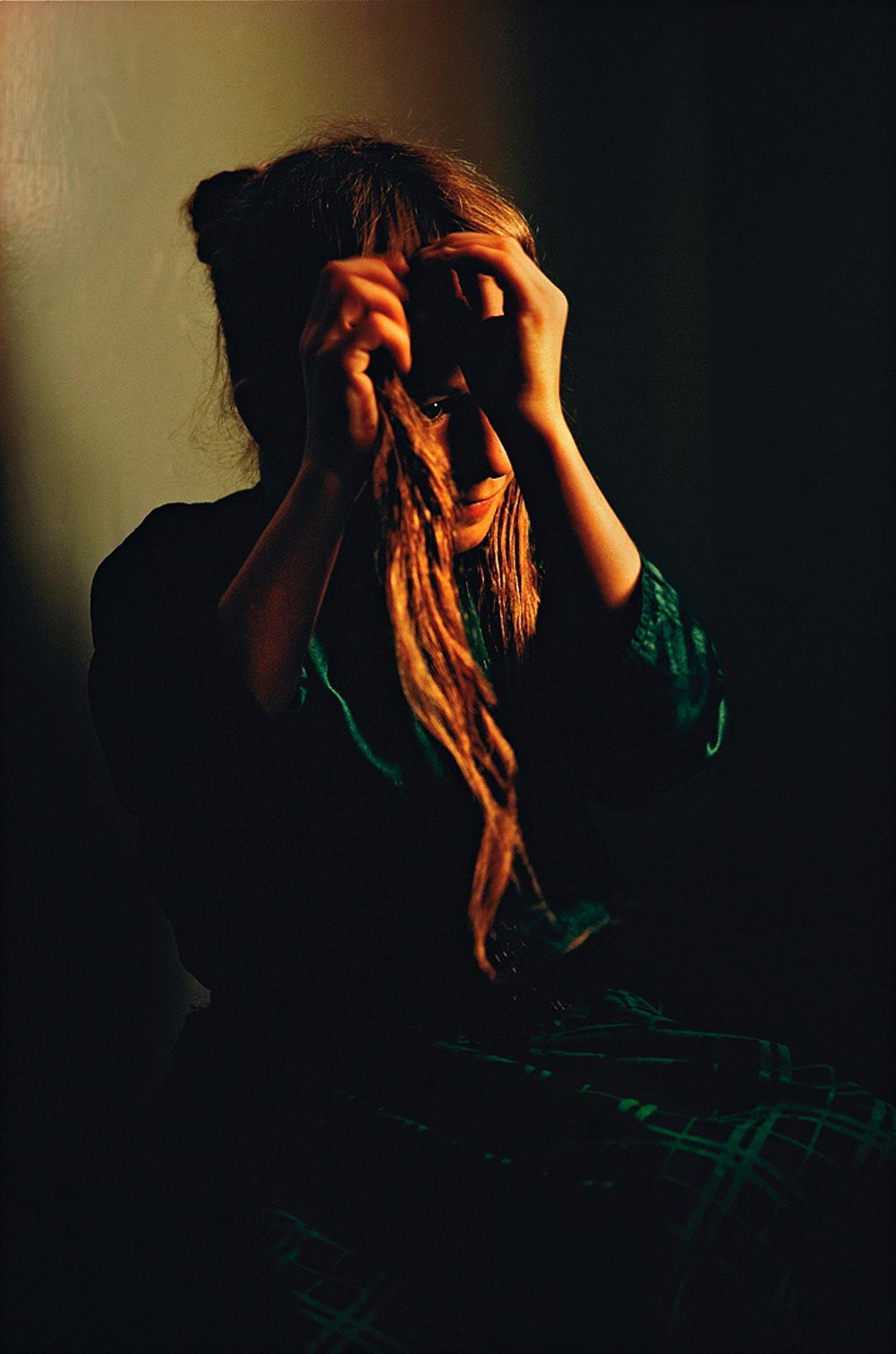 Kathy Walter braiding her hair, Spring Creek Hutterite colony, Montana ...